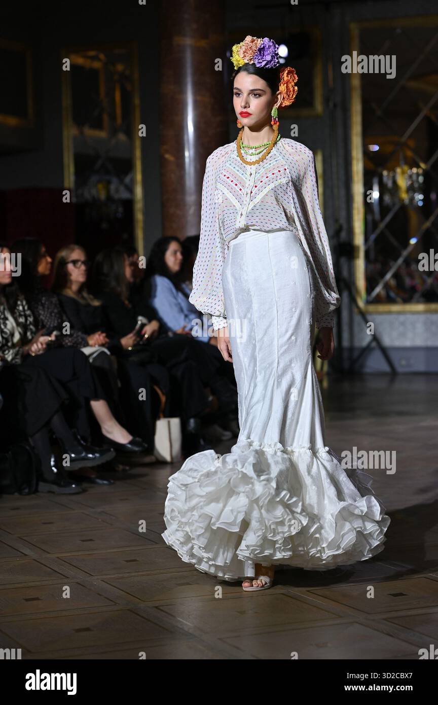 A model walks in a Angela Isa design at the International Flamenco ...