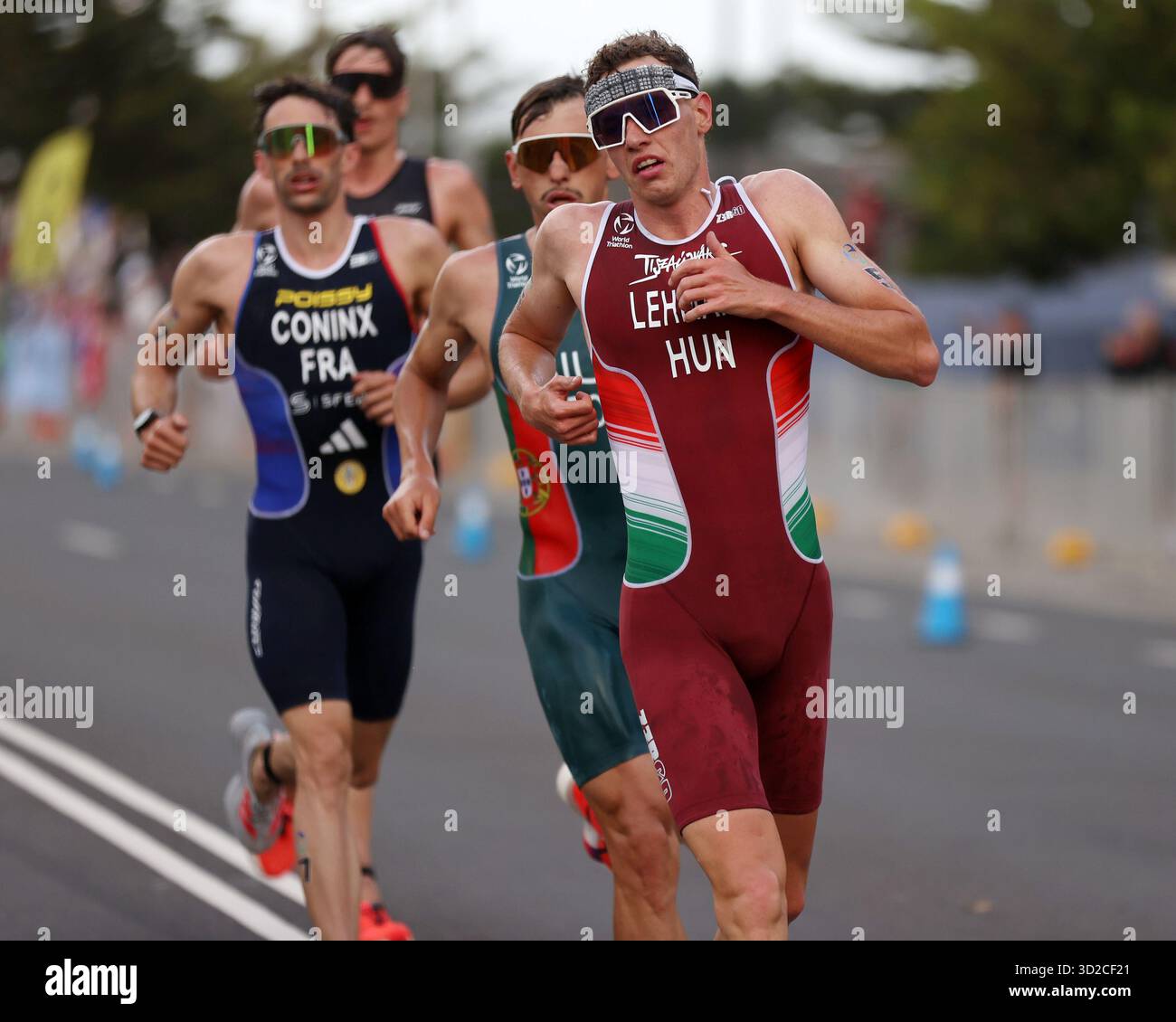 Csongor Lehmann, foreground, of Hungary, at the 2025 World Triathlon ...