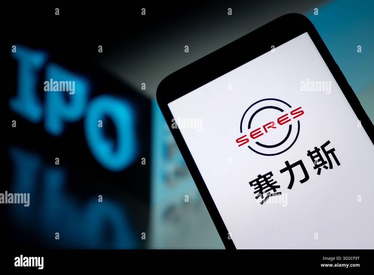 An illustration photo shows SERES logo in a smartphone with the IPO ...