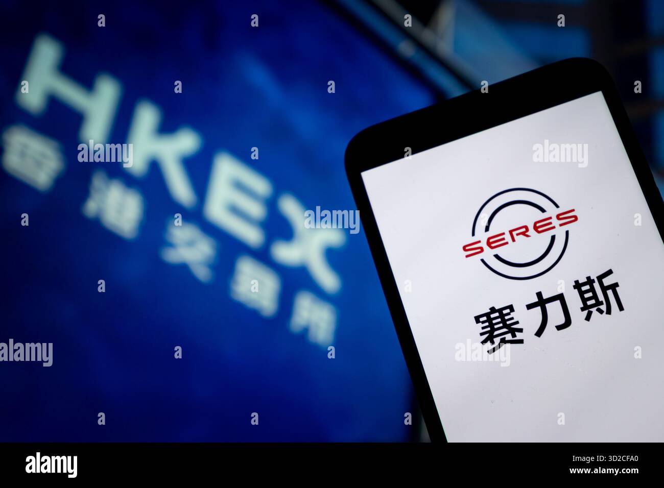 An illustration photo shows SERES logo in a smartphone with the HKEX ...