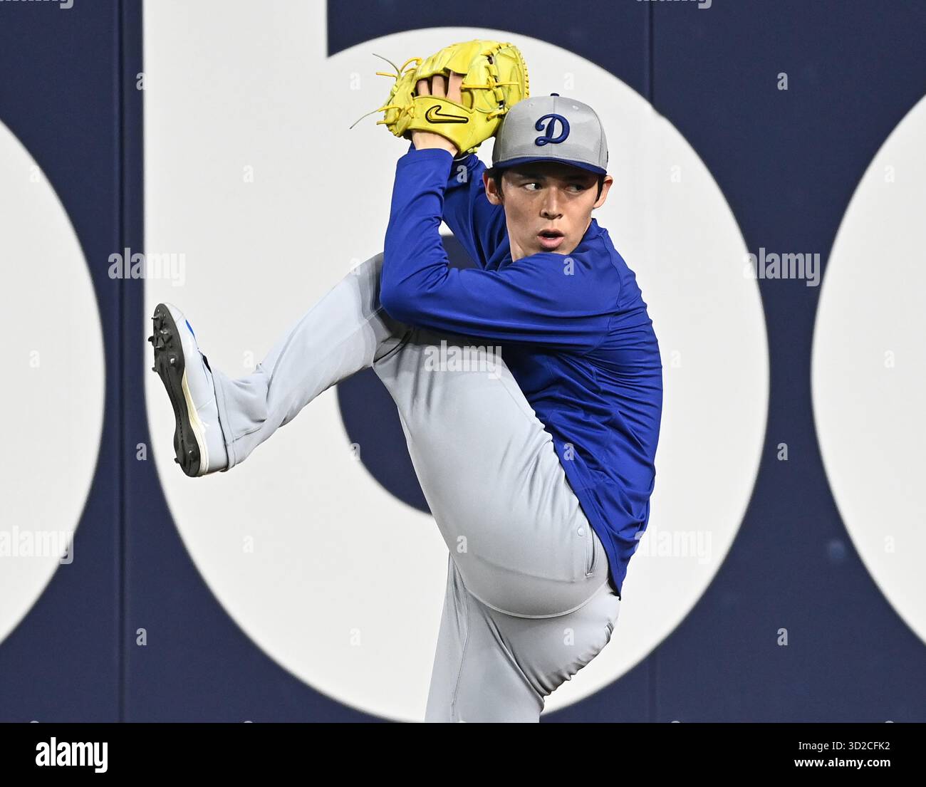 Los Angeles Dodgers pitcher Roki Sasaki throws a ball in practice ...