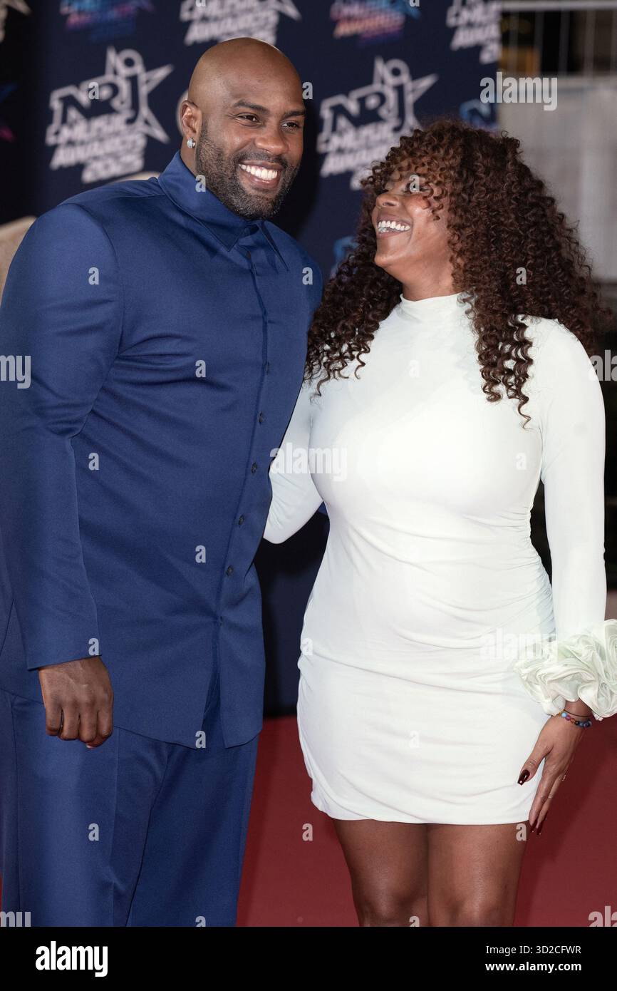 Cannes, France. 31st Oct, 2025. Teddy Riner and his wife Luthna Plocus ...