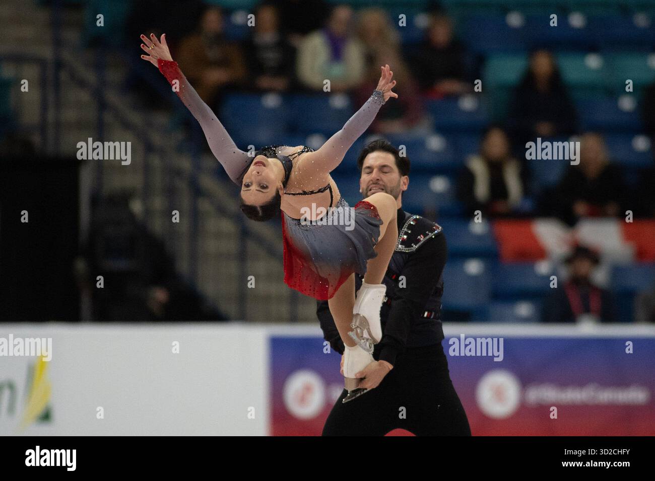 Deanna Stellato-Dudek and Maxime Deschamps of Canada skate in the Pairs ...