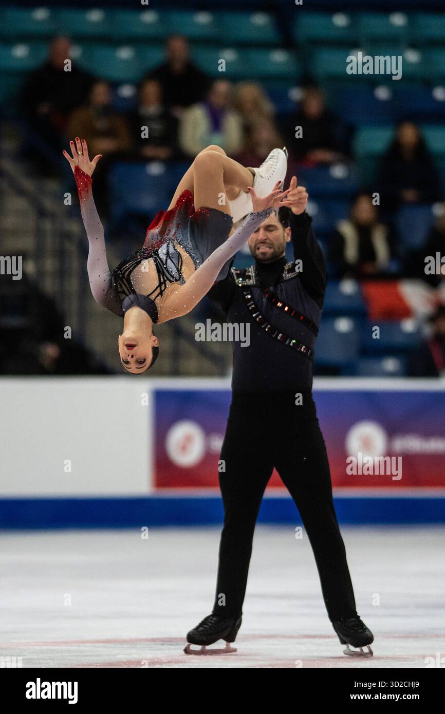 Deanna Stellato-Dudek and Maxime Deschamps of Canada skate in the Pairs ...