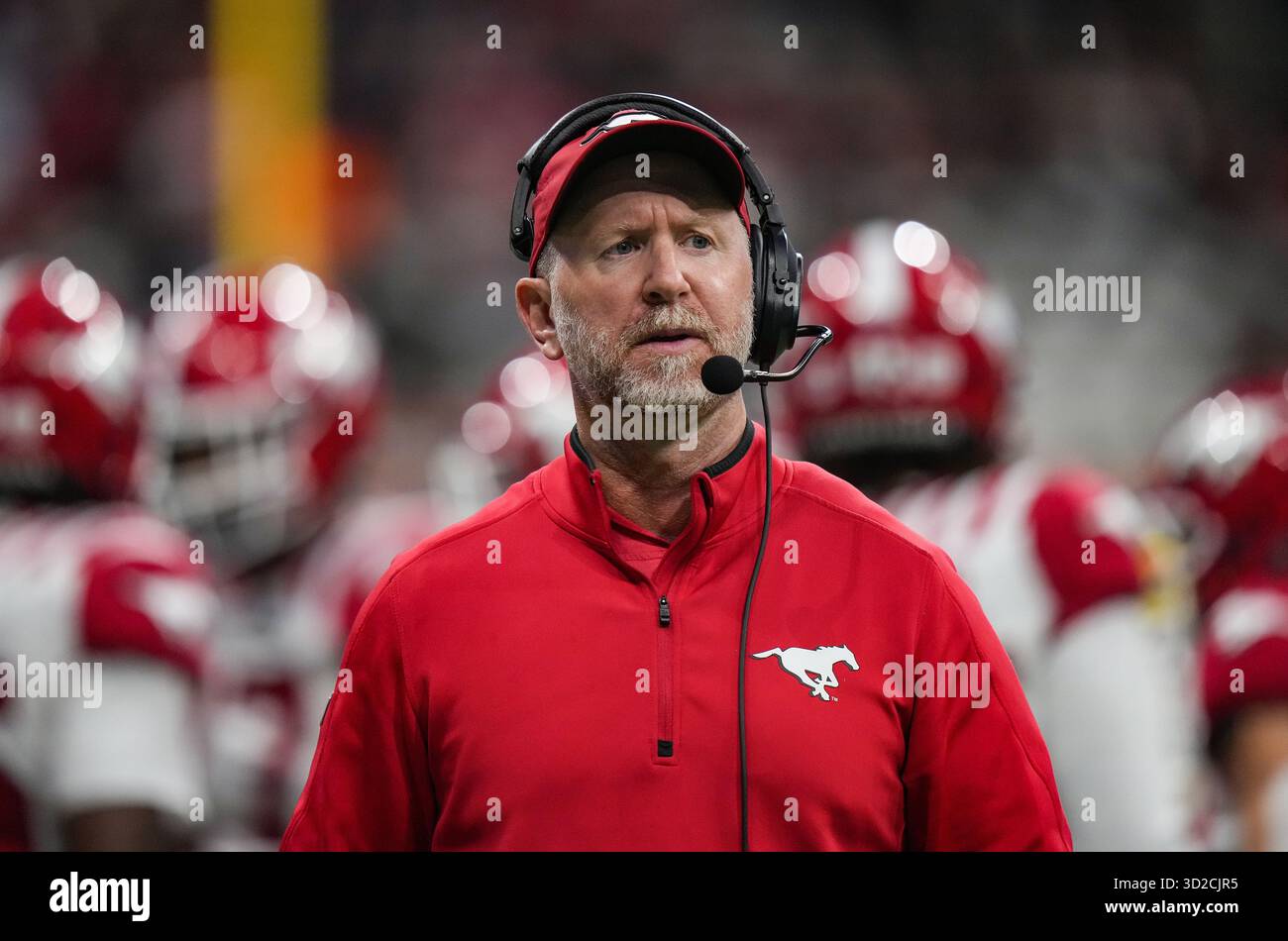 Calgary Stampeders head coach Dave Dickenson walks on the sideline ...