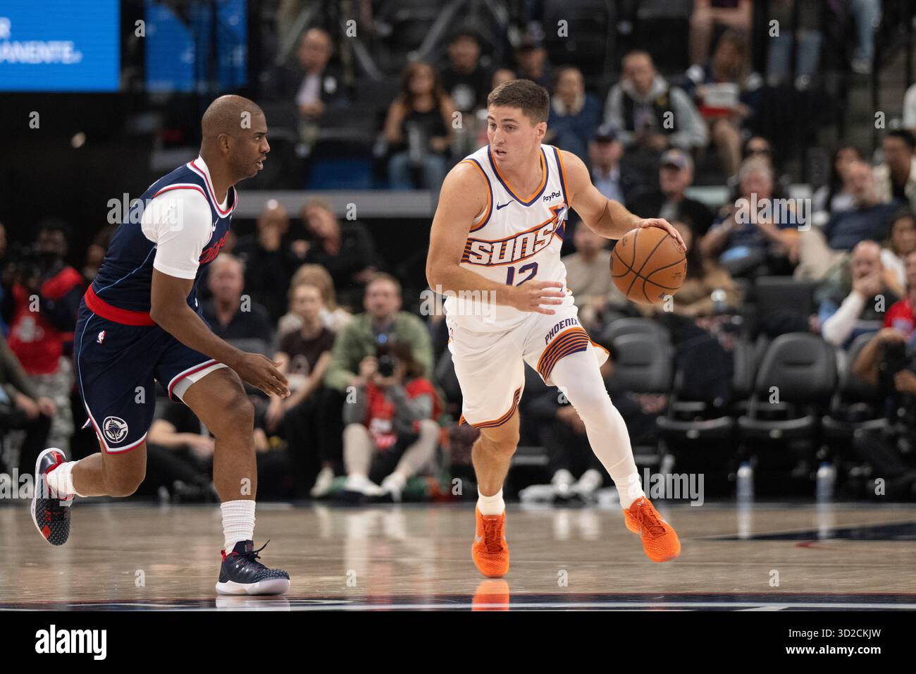 Phoenix Suns guard Collin Gillespie (12) dribbles as Los Angeles ...