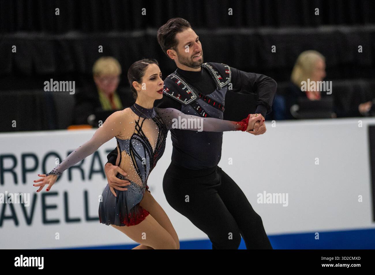 Deanna Stellato-Dudek and Maxime Deschamps of Canada skate in the Pairs ...
