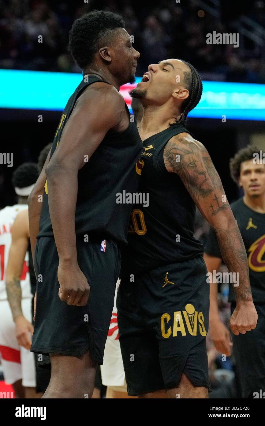 Cleveland Cavaliers' Thomas Bryant, left, and Jaylon Tyson, right ...