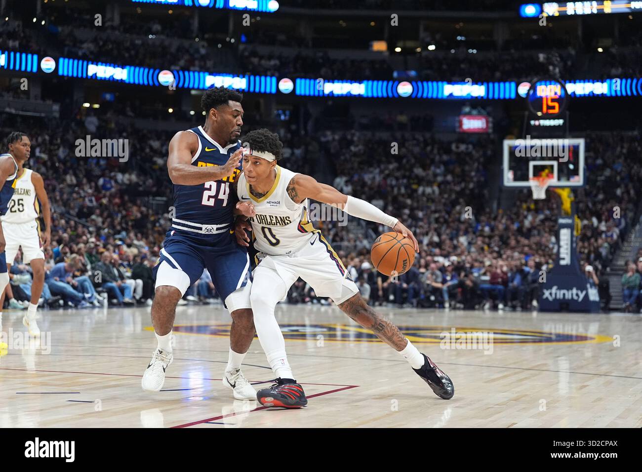 New Orleans Pelicans rookie guard Jeremiah Fears drives past Denver ...