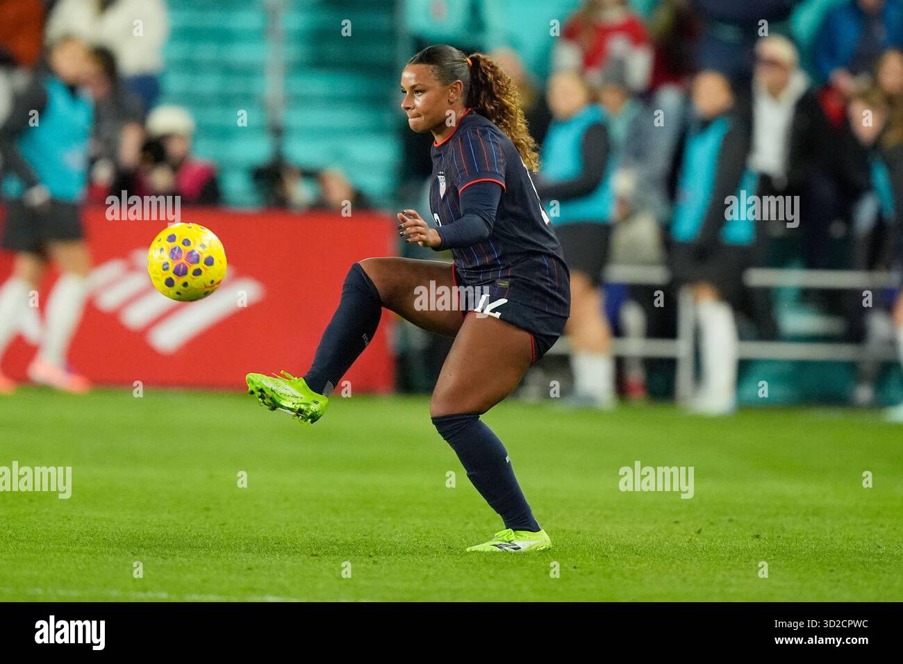 United States forward Michelle Cooper kicks the ball during the first ...