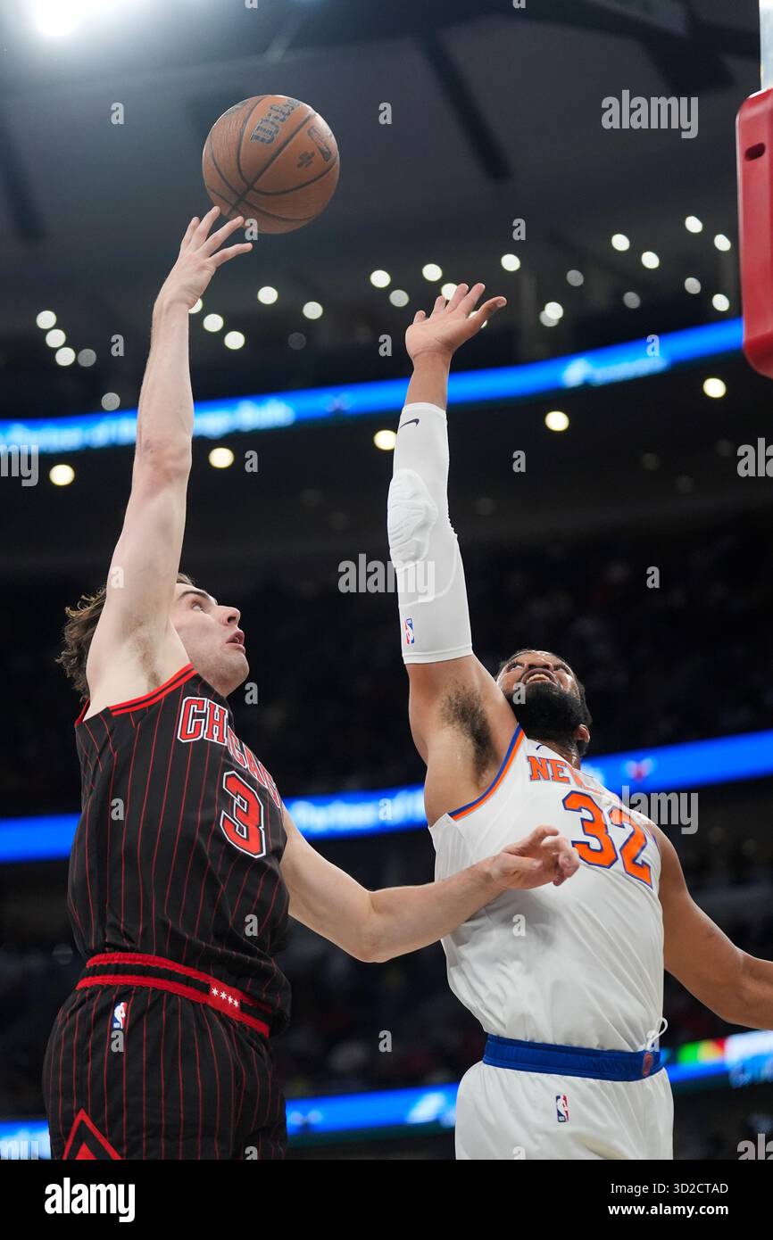 New York Knicks center Karl-Anthony Towns (32) tries to block Chicago ...