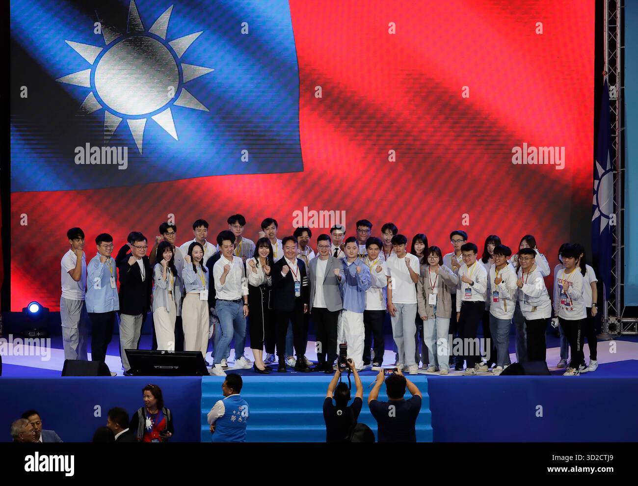 Party members of Taiwan's Nationalist Party, or Kuomintang (KMT) take ...