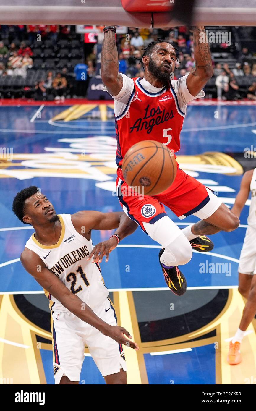 Los Angeles Clippers forward Derrick Jones Jr., right dunks as New ...