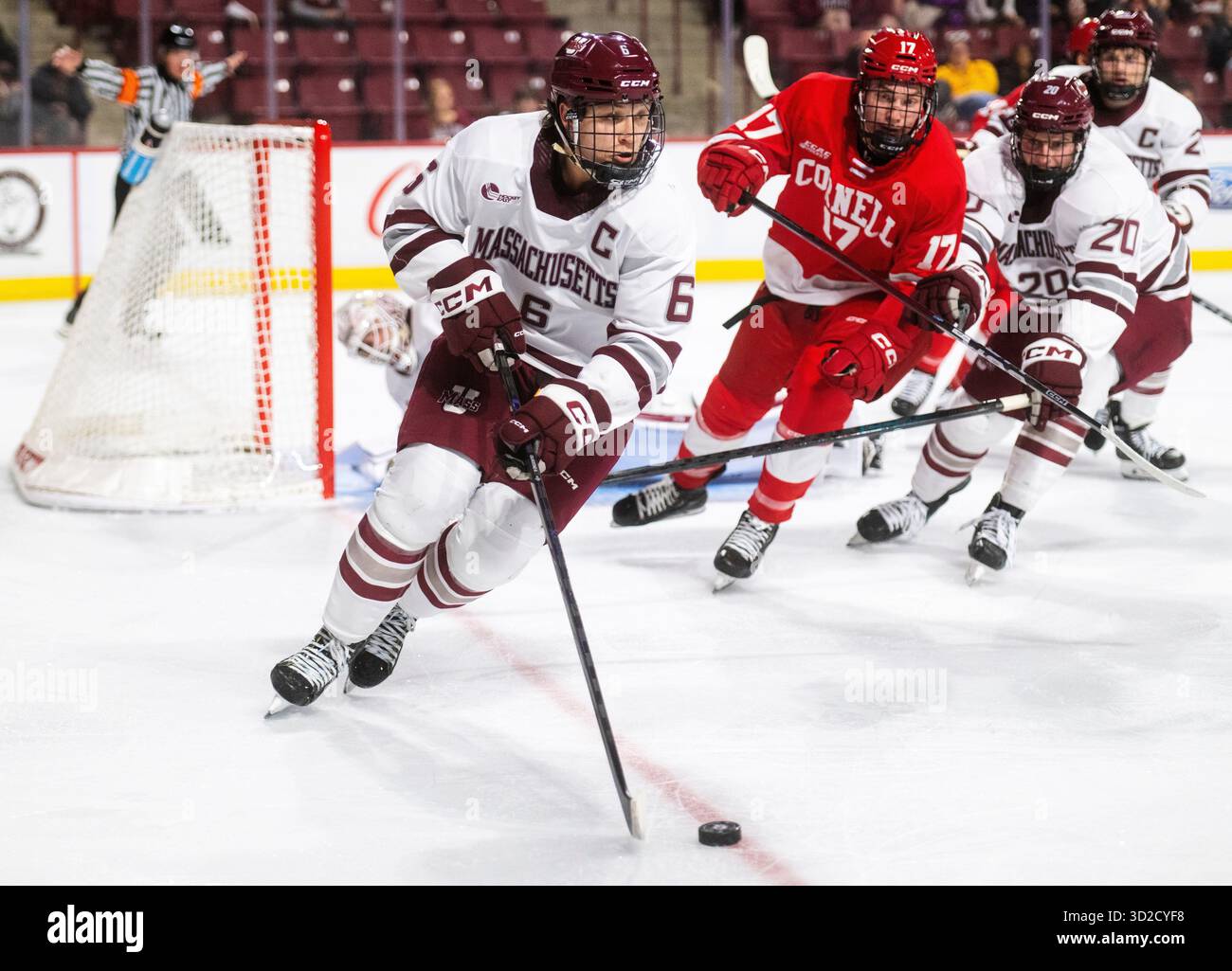 UMass defenseman Lucas Olvestad (6) takes control of the puck during ...