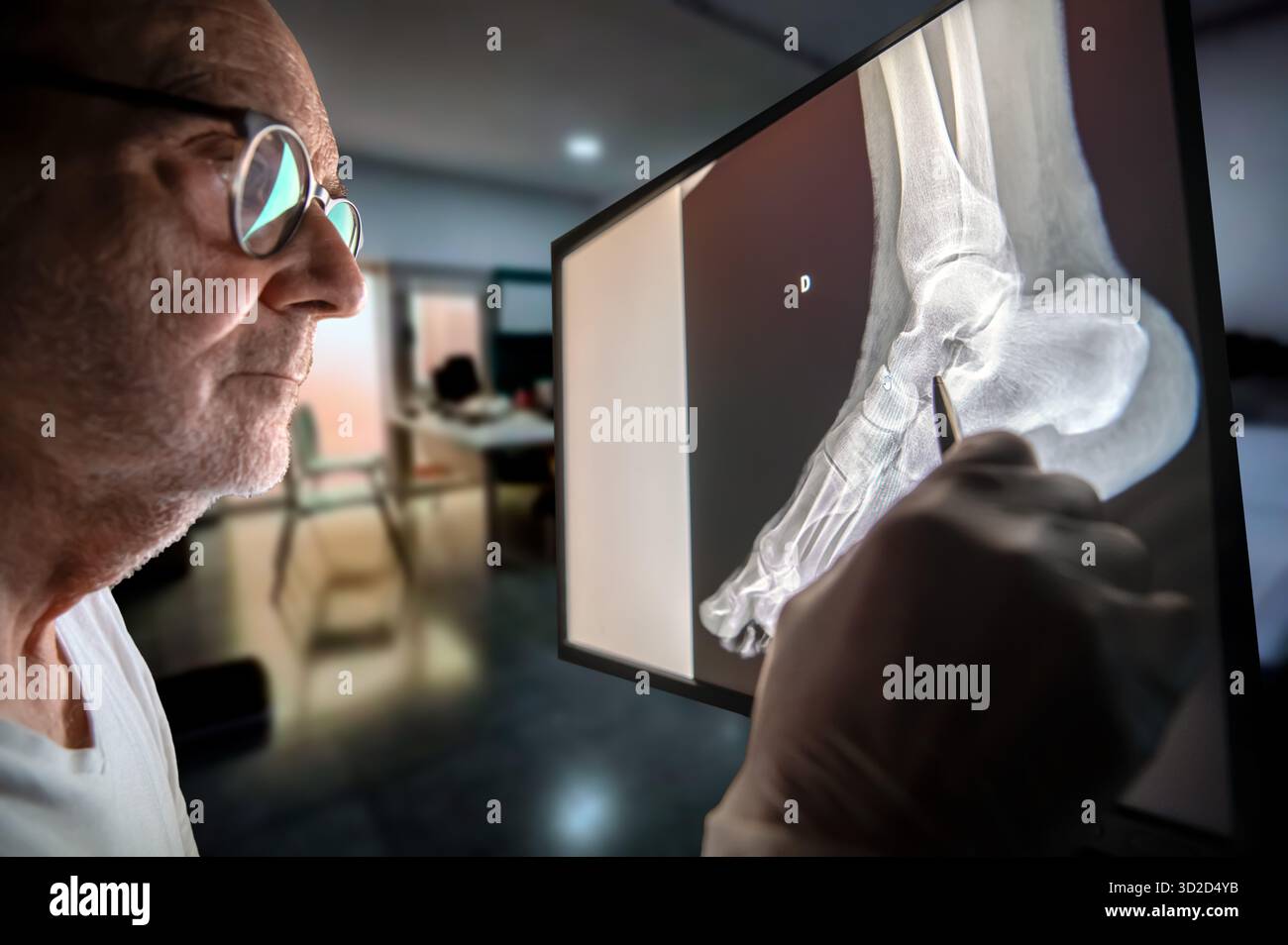 Doctor examines detailed foot hi-res stock photography and images - Alamy