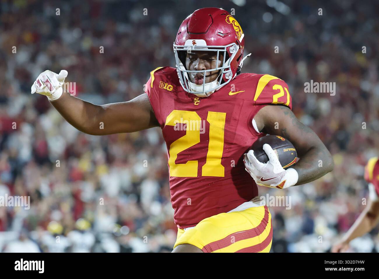 Southern California running back Bryan Jackson (21) races into the end ...