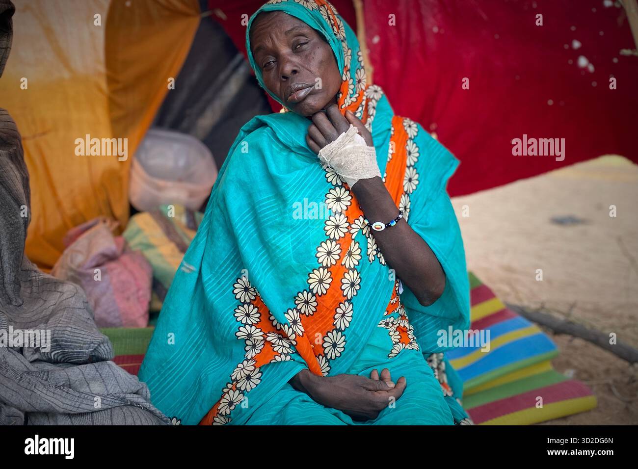 An injured Sudanese woman who fled el-Fasher city, after Sudan's ...