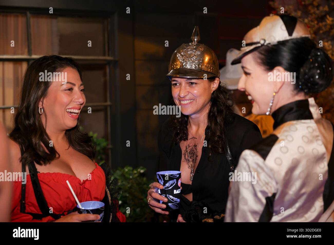 Imene Meziane, from left, Michelle Rodriguez, and Dita Von Teese attend ...