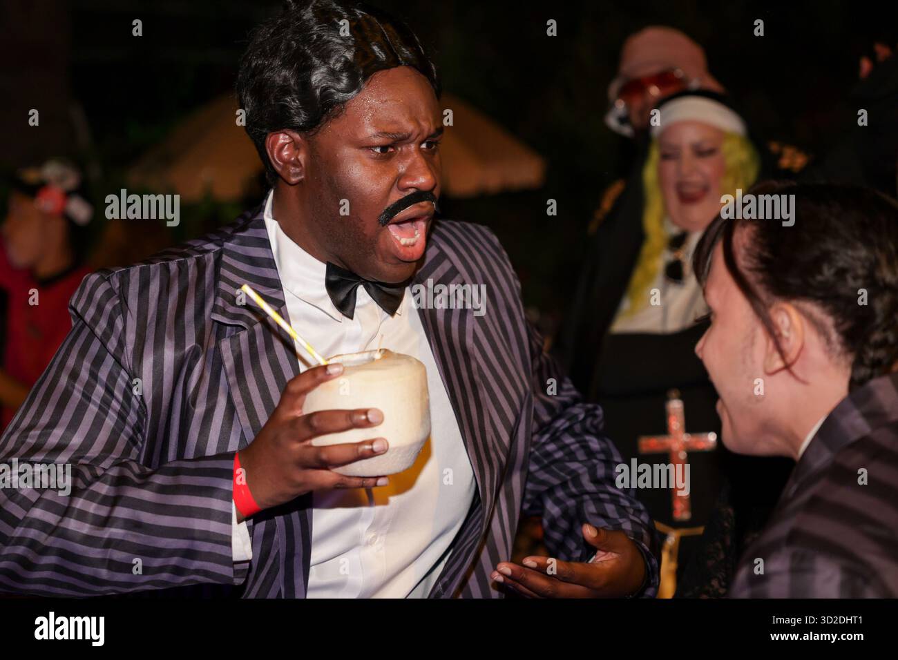 O'Neil Thomas, left, and Ramon Nuñez attend Janelle Monáe's Halloween ...