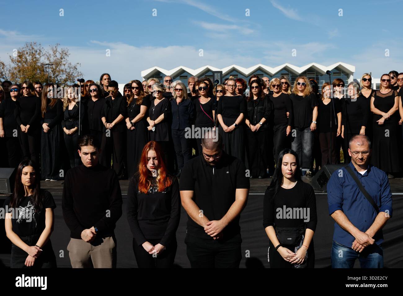 People observe 16 minutes of silence in memory of the victims, outside ...