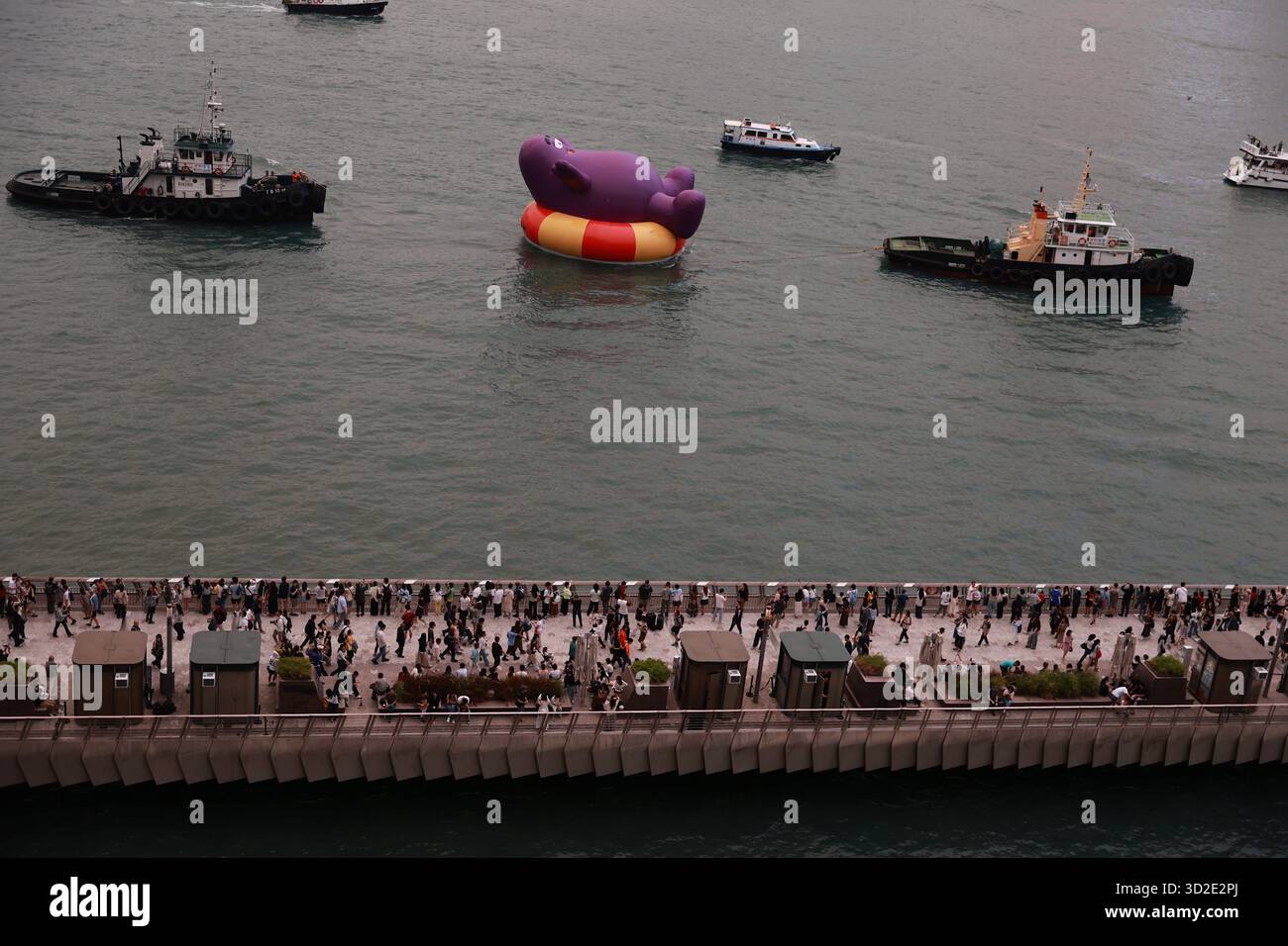 A giant inflatable sculpture takes part in a Water Parade at Victoria ...