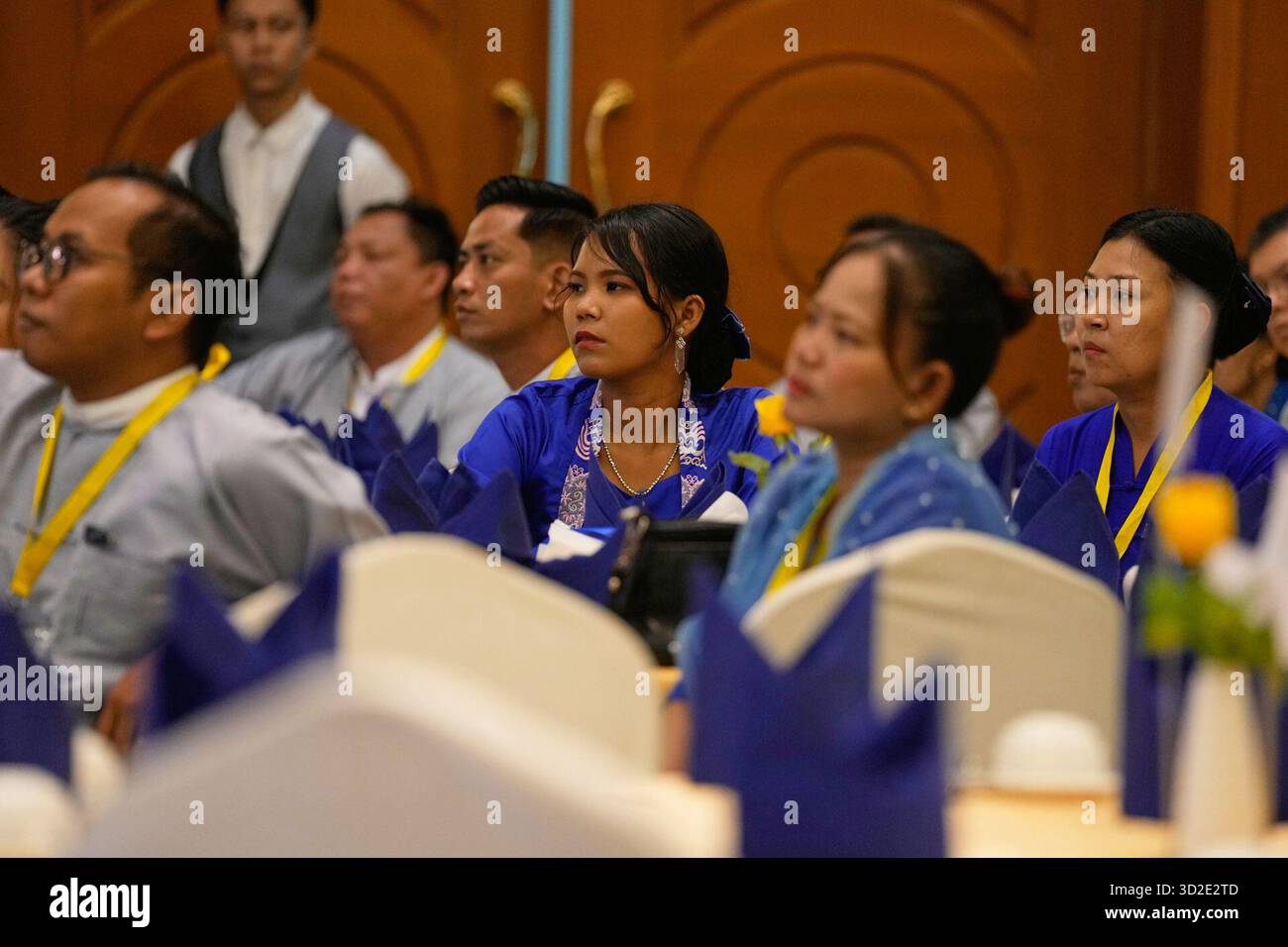 Members of the People's Pioneer Party (PPP) attend a ceremony to ...