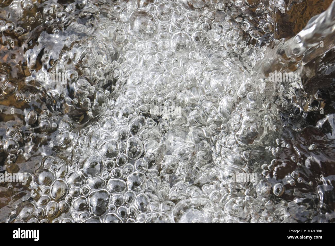 Boiling clear water with fresh bubble texture. clean liquid surface ...