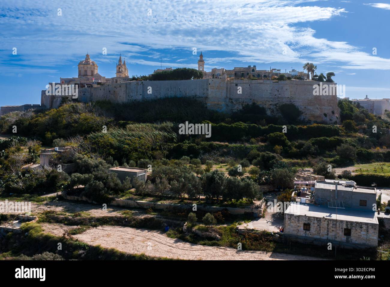 Aerial view of Mdina, Malta, with bastion walls and cathedral dome ...