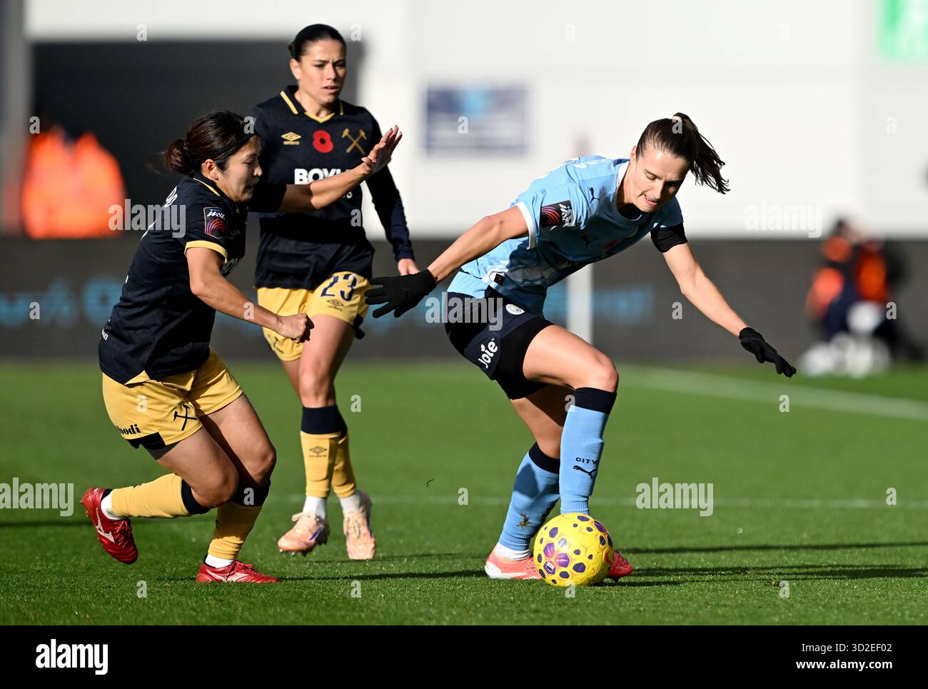 West Ham United's Yu Endo (left) and Manchester City's Vivianne Miedema ...