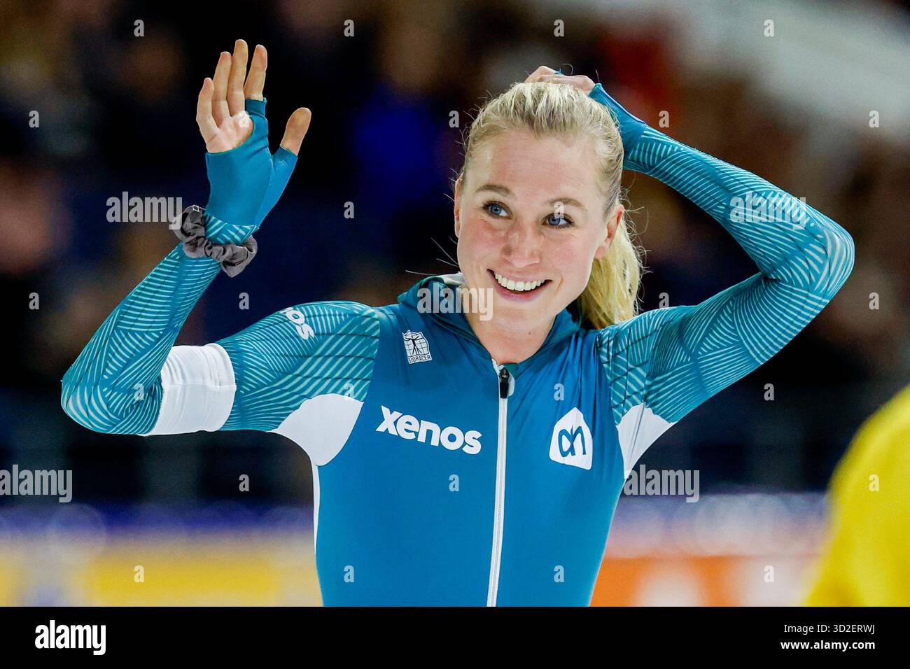 Merel Conijn of the Netherlands and Team Albert Heijn Zaanlander waves ...