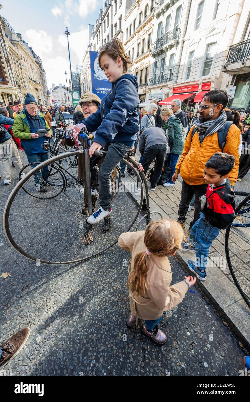 London, UK. 1st Nov, 2025. Children try out a 1886 Singer (penny ...