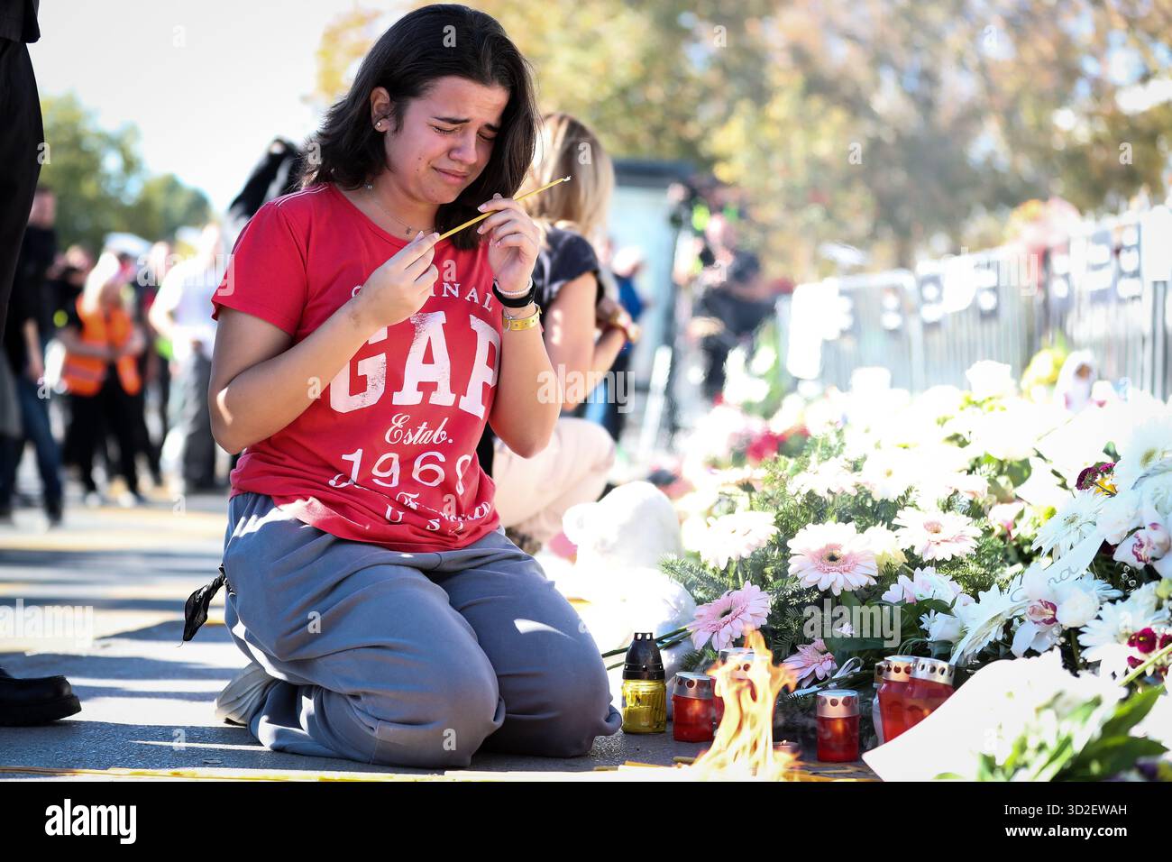 Novi Sad, Serbia. 1st Nov, 2025. A girl is seen crying while lighting ...