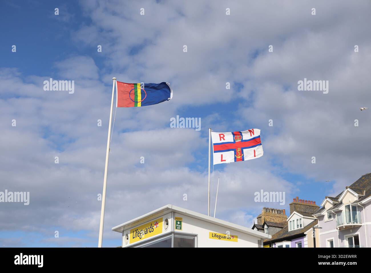 RNLI flag Royal National Lifeboat Institution on Aberystwyth beach ...