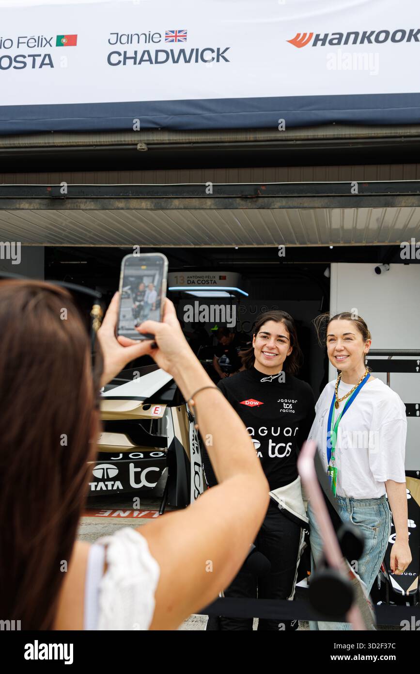 Valencia, Spain. 31st Oct 2025. Jamie Chadwick poses with a member of ...