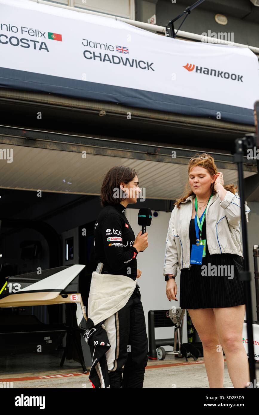 Valencia, Spain. 31st Oct 2025. Jamie Chadwick speaks with a member of ...