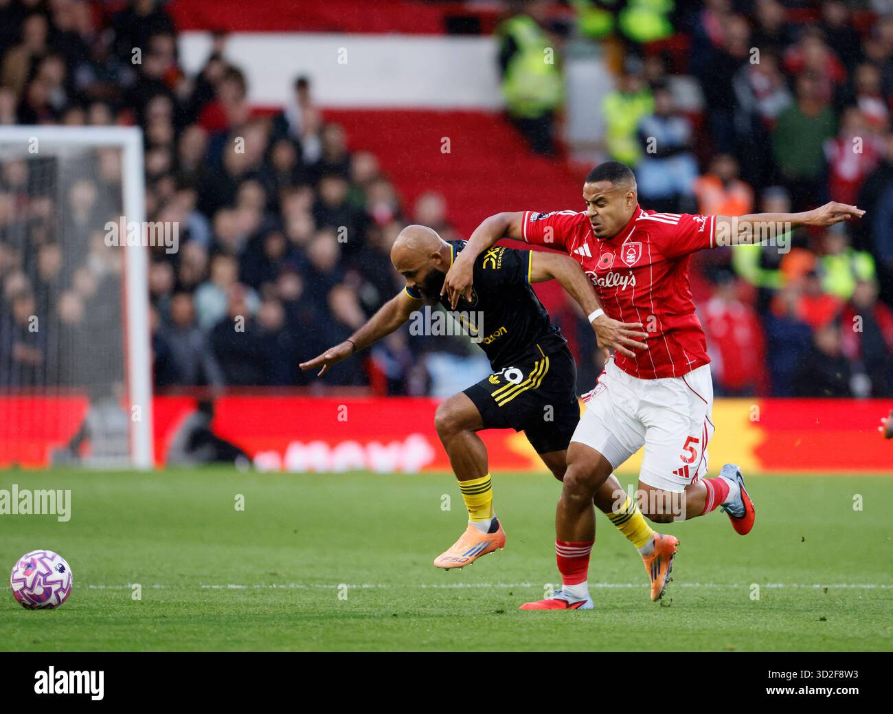Manchester United's Bryan Mbeumo (left) and Nottingham Forest's Murillo ...