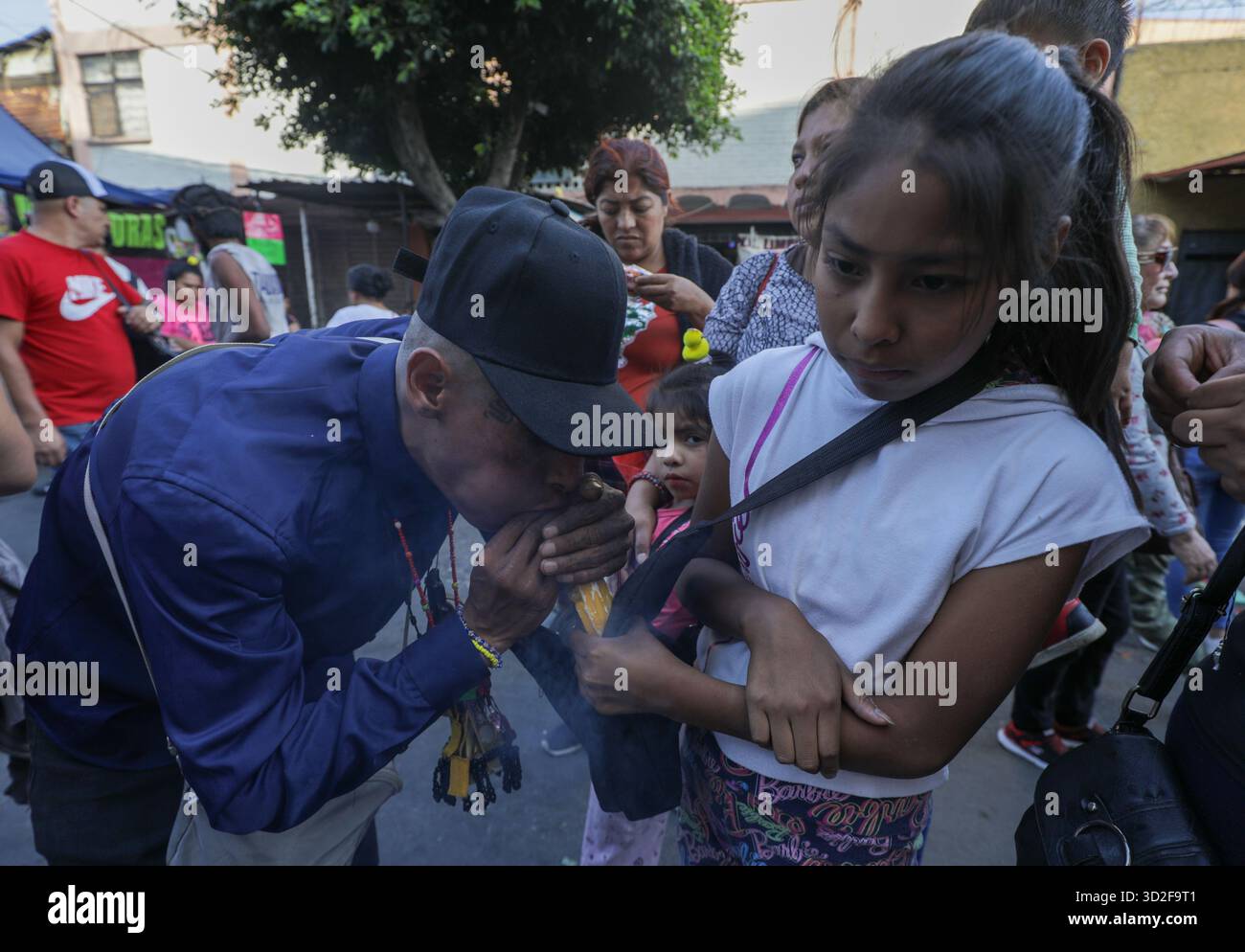 Non Exclusive: Devotees attend the altar of Santa Muerte located on ...