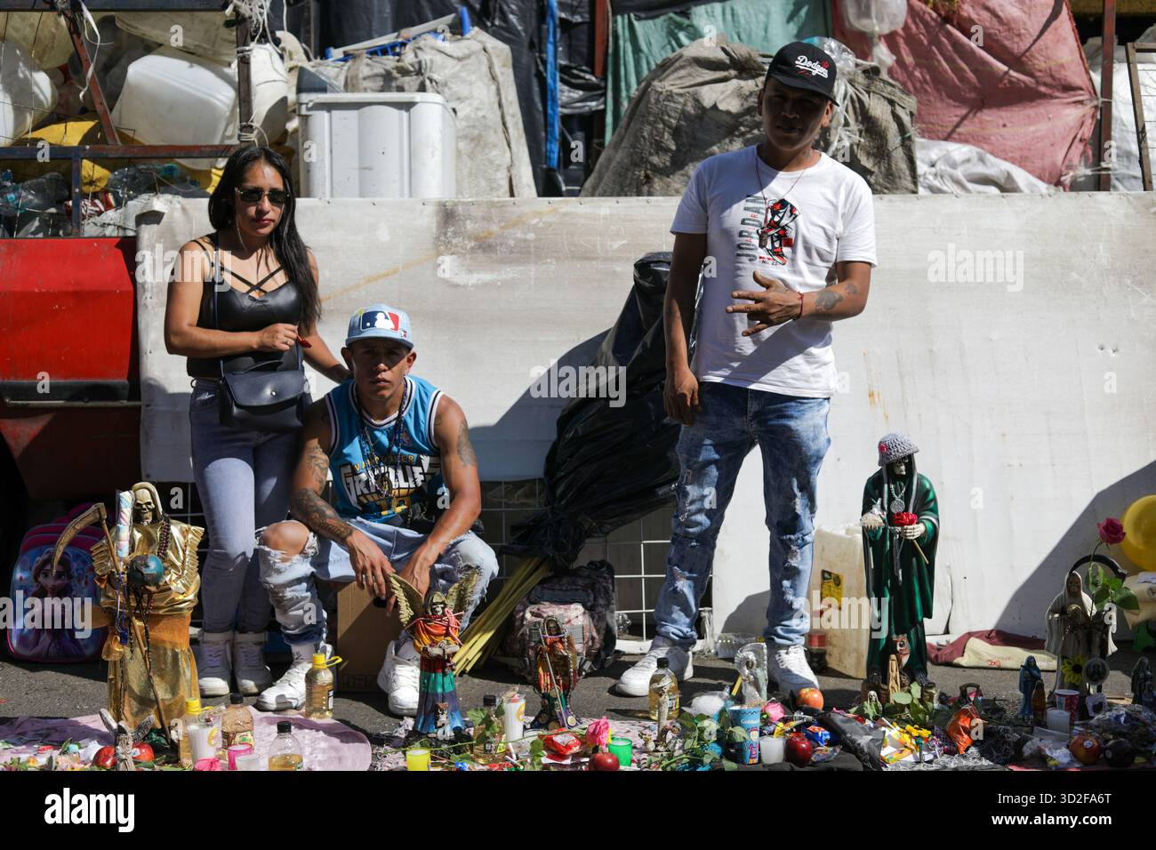 Non Exclusive: Devotees attend the altar of Santa Muerte located on ...