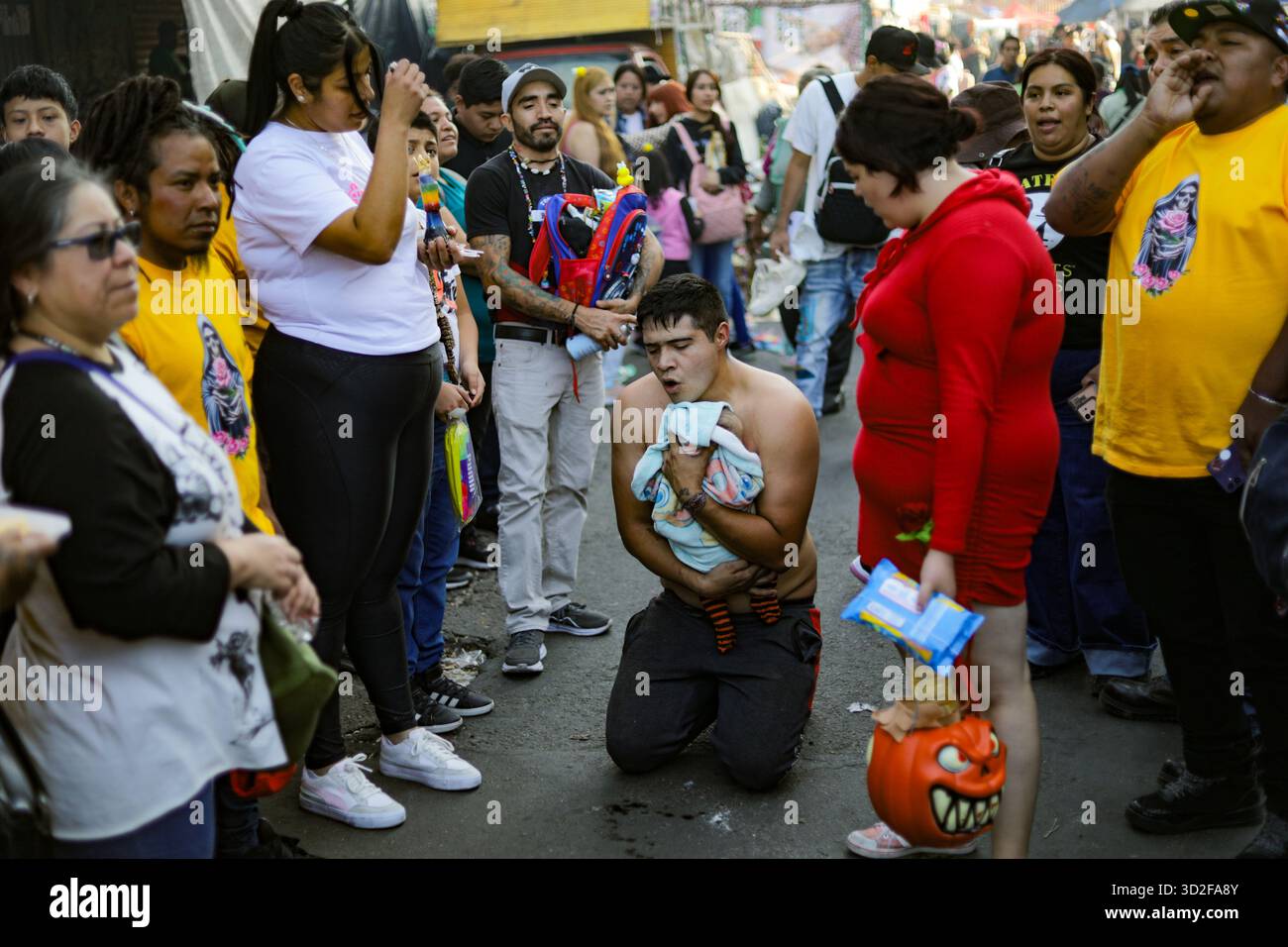 Non Exclusive: Devotees attend the altar of Santa Muerte located on ...