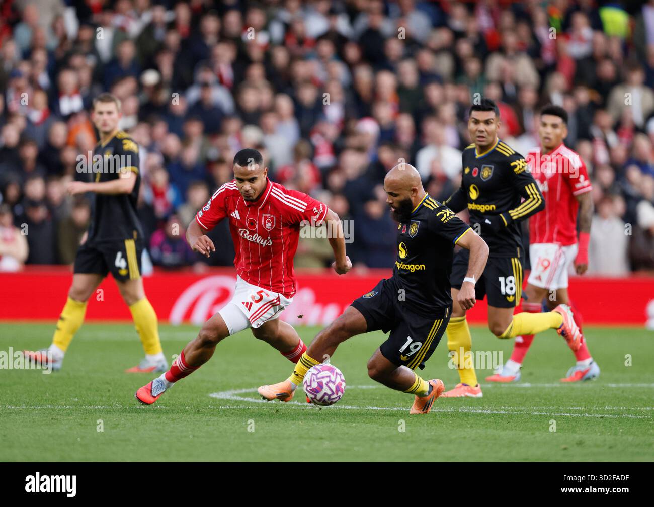 Manchester United's Bryan Mbeumo (centre right) and Nottingham Forest's ...