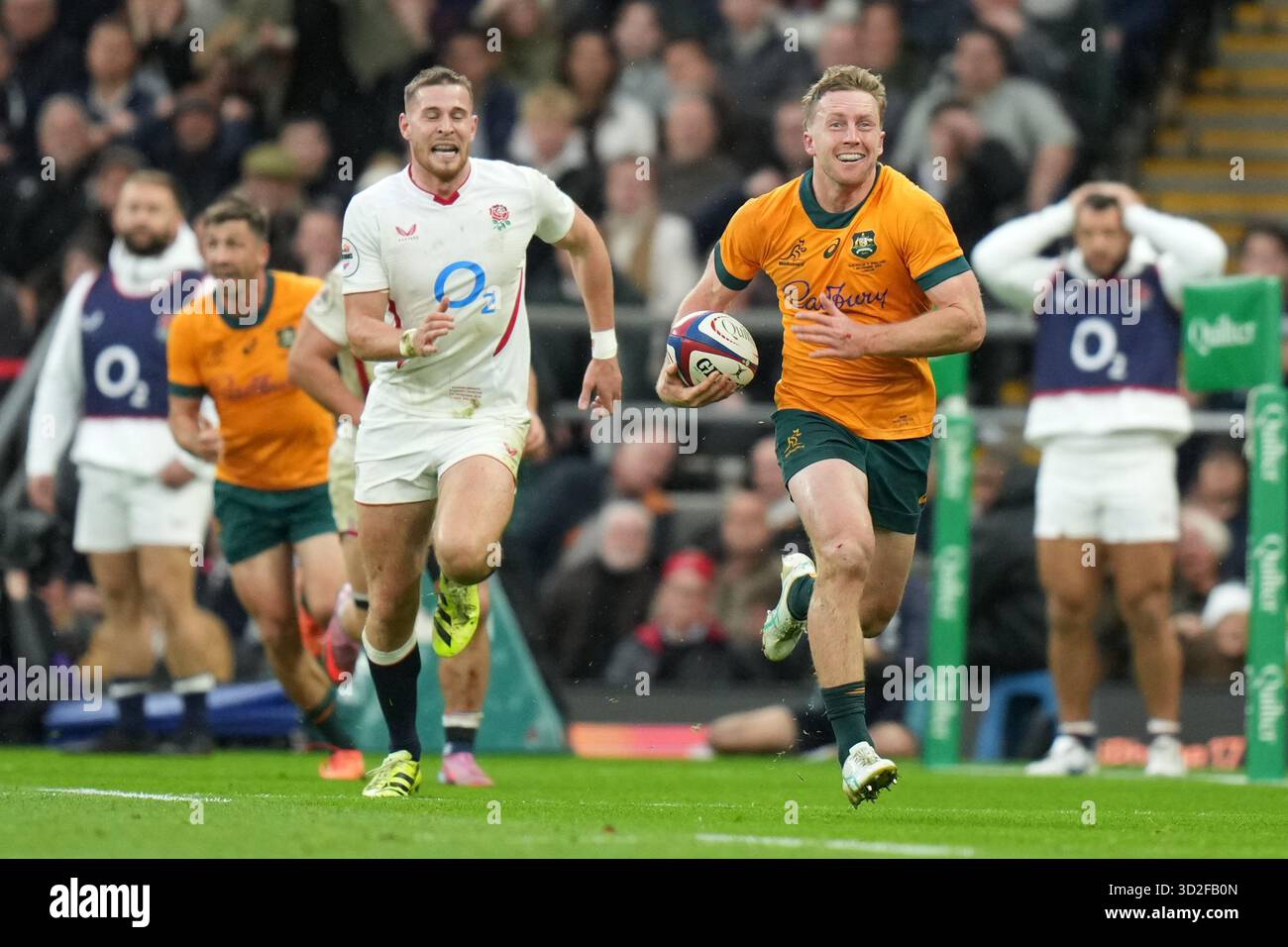 Australia's Harry Potter smiles as he races in to score a try during ...