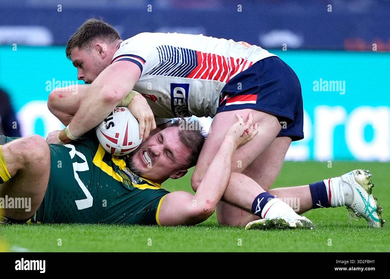 Australia's Angus Crichton (left) and England's Morgan Knowles during ...