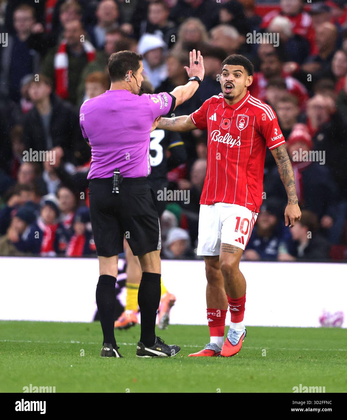 Morgan Gibbs-White (NF) protests to referee Darren England after the ...