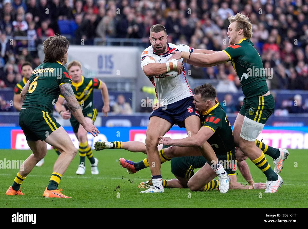 England's Mike McMeeken is tackled by Australia's Angus Crichton ...