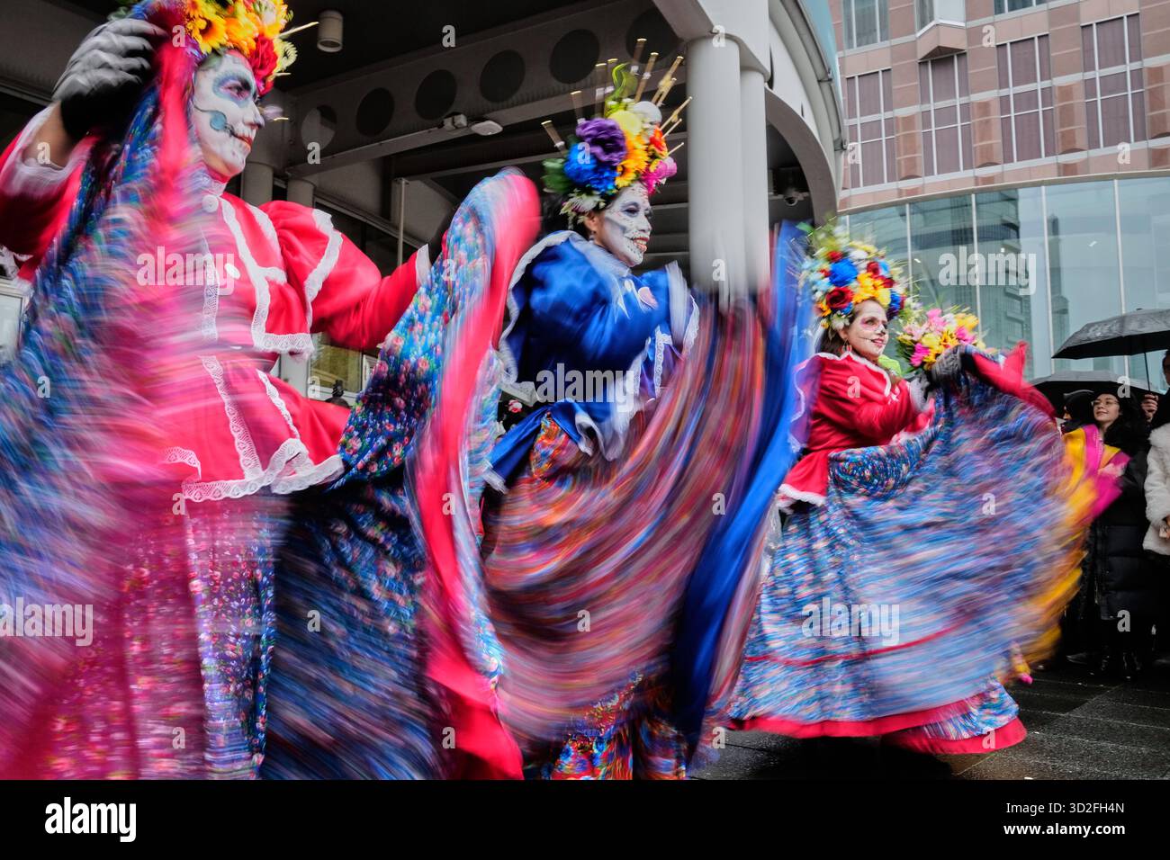 Women dance as they take part in the traditional Catrina parade marking ...