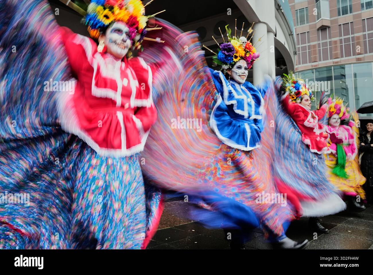 Women dance as they take part in the traditional Catrina parade marking ...