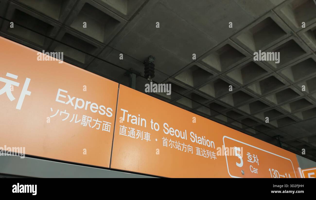 SEOUL, SOUTH KOREA - OCTOBER 11, 2025 - Signage providing directions ...