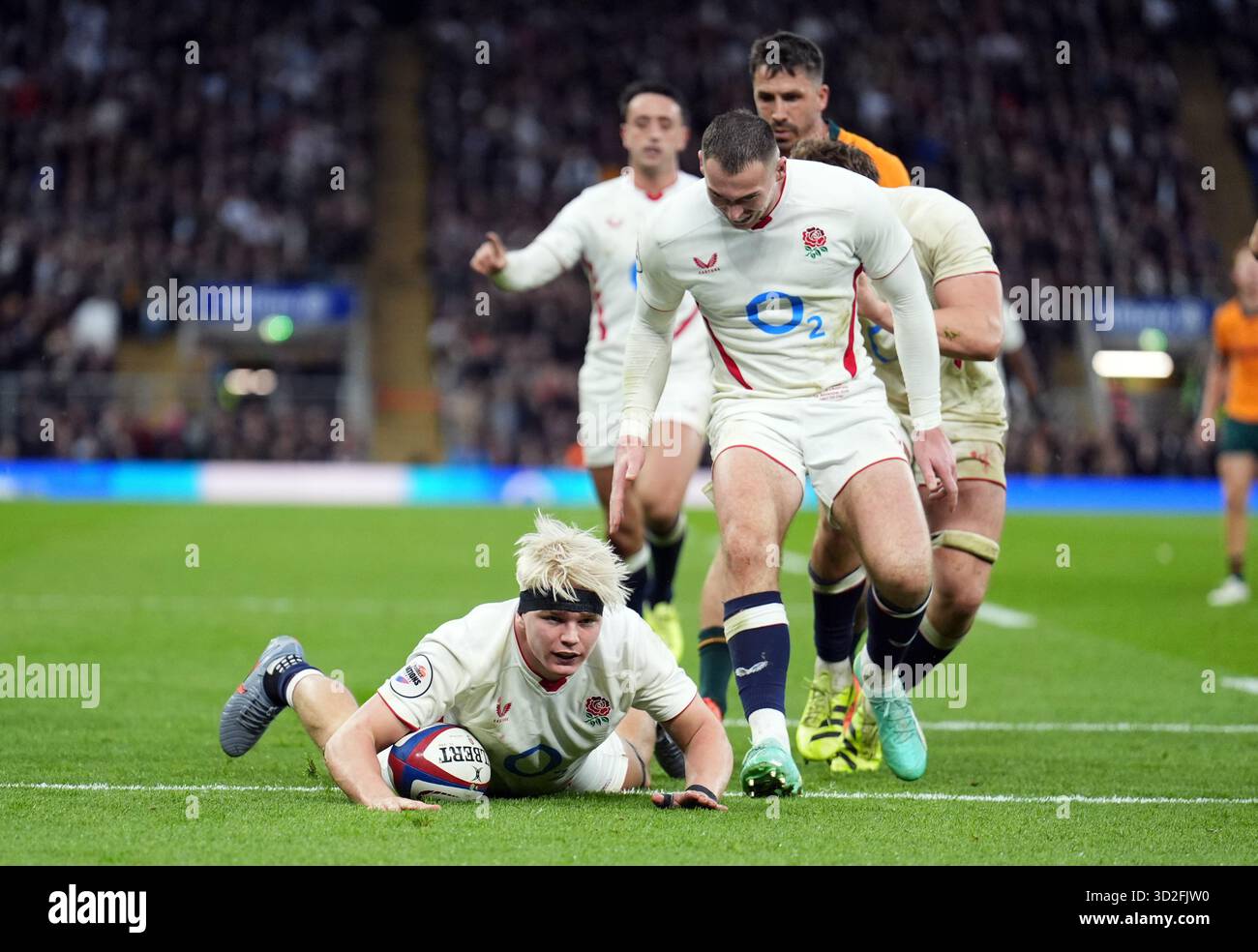 England’s Henry Pollock scores their side’s second try of the game ...