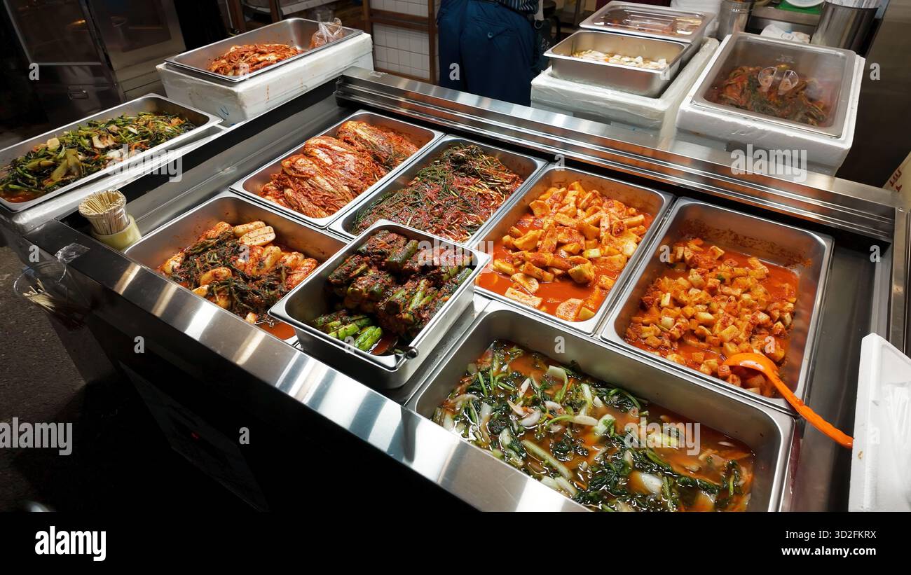 SEOUL, SOUTH KOREA - OCTOBER 11, 2025 - Kimchi and various banchan are ...