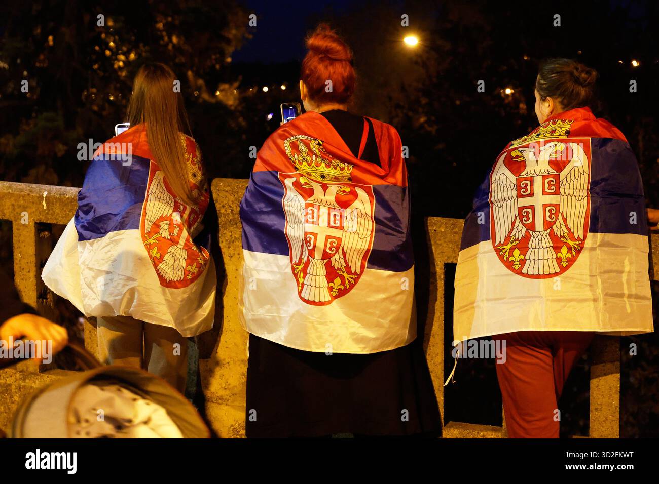 People gather on the first anniversary of the disaster that killed 16 ...